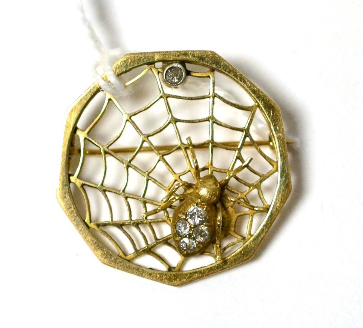 Lot 341 - A diamond set spider and web brooch, a