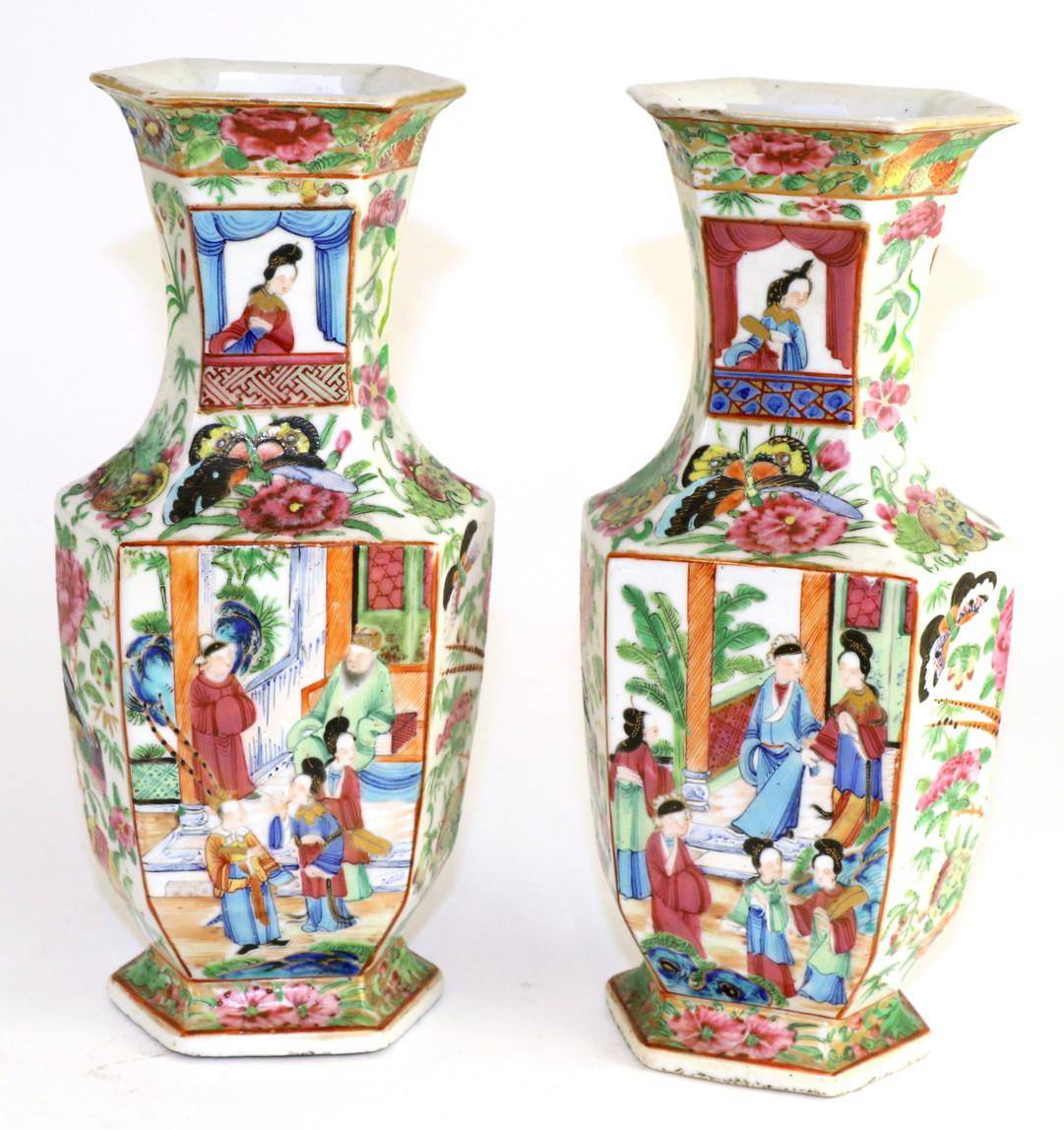 Lot 214 - A pair of Cantonese hexagonal baluster vases,