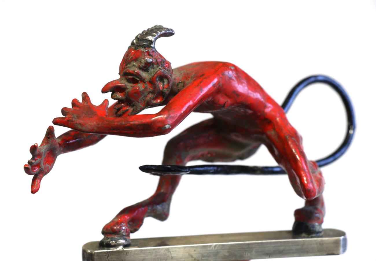 Lot 1111 - A Rare Red Devil Motorhead Car Mascot,