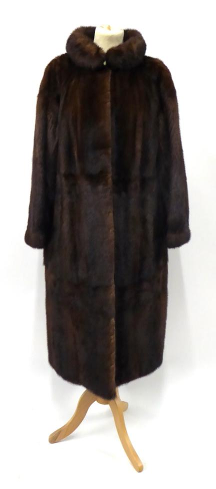 Lot 1041 - Dark mink coat labelled Furs By Stephen,