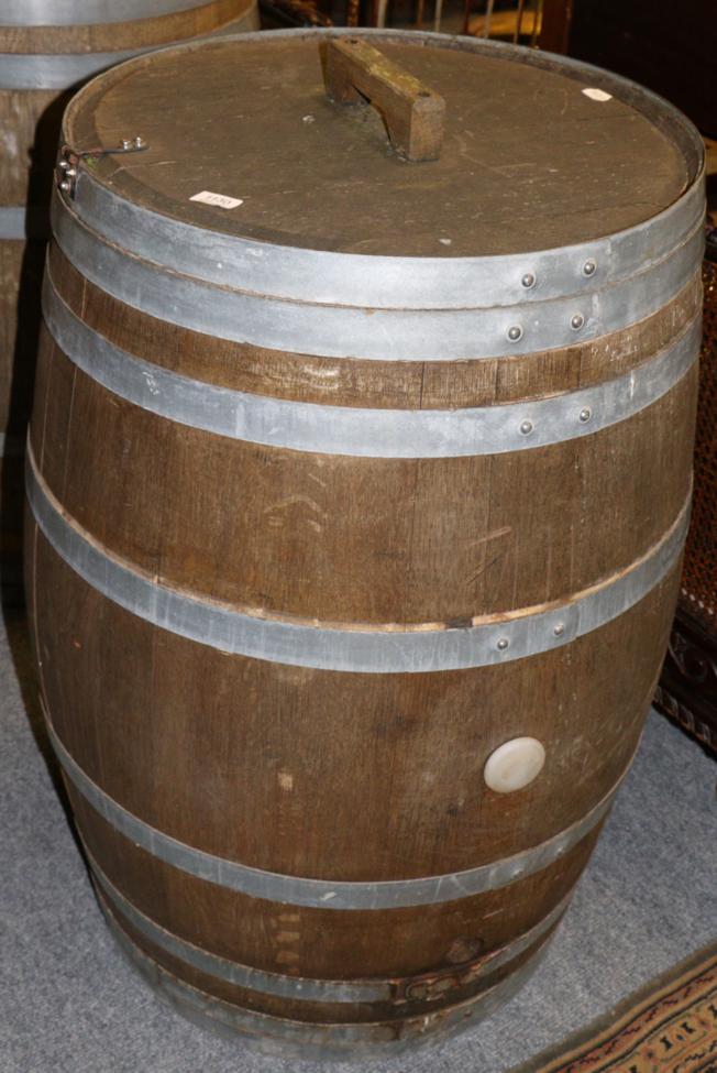 Lot 1130 - A coopered oak barrel with lid