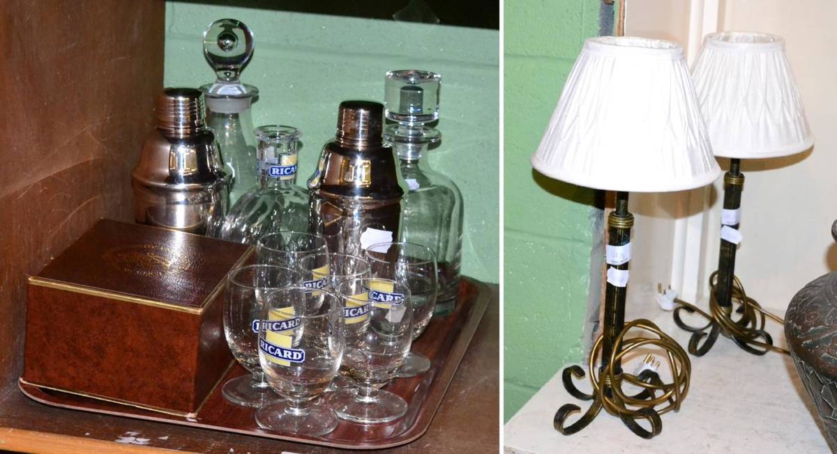 Lot 121 - Pair of lamps, two cocktail shakers, two