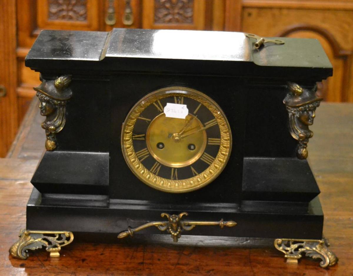 Lot 335 - A 19th century black slate mantel clock of