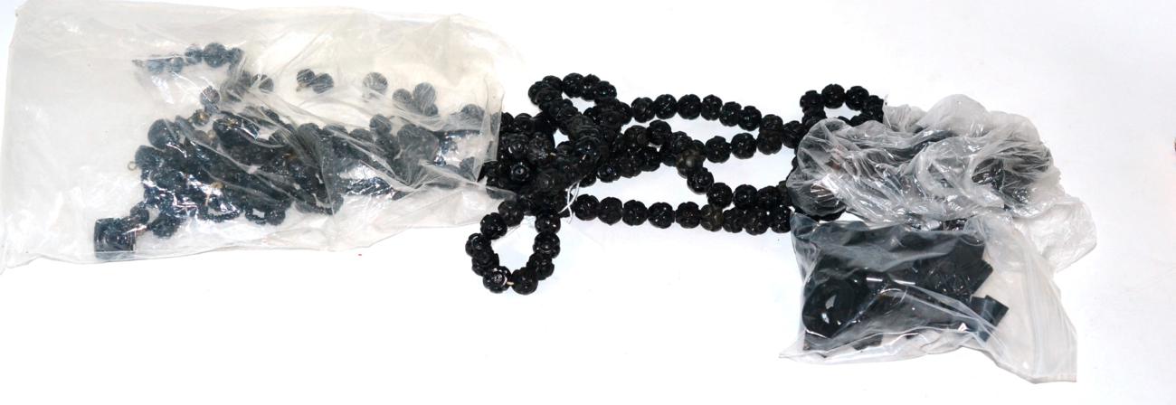 Lot 66 - A bog oak bead necklace, formed of a