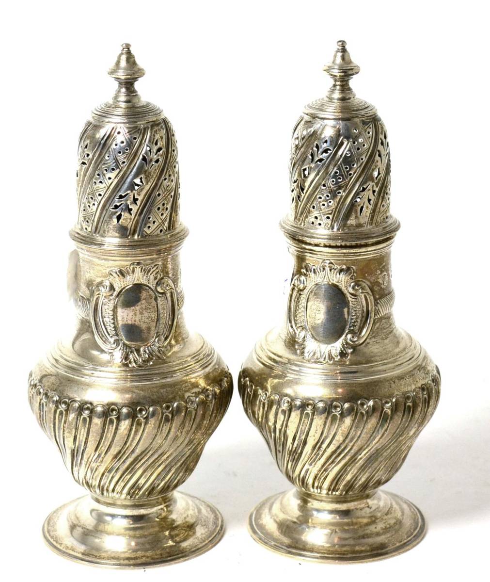 Lot 174 - A pair of Victorian silver sugar casters by