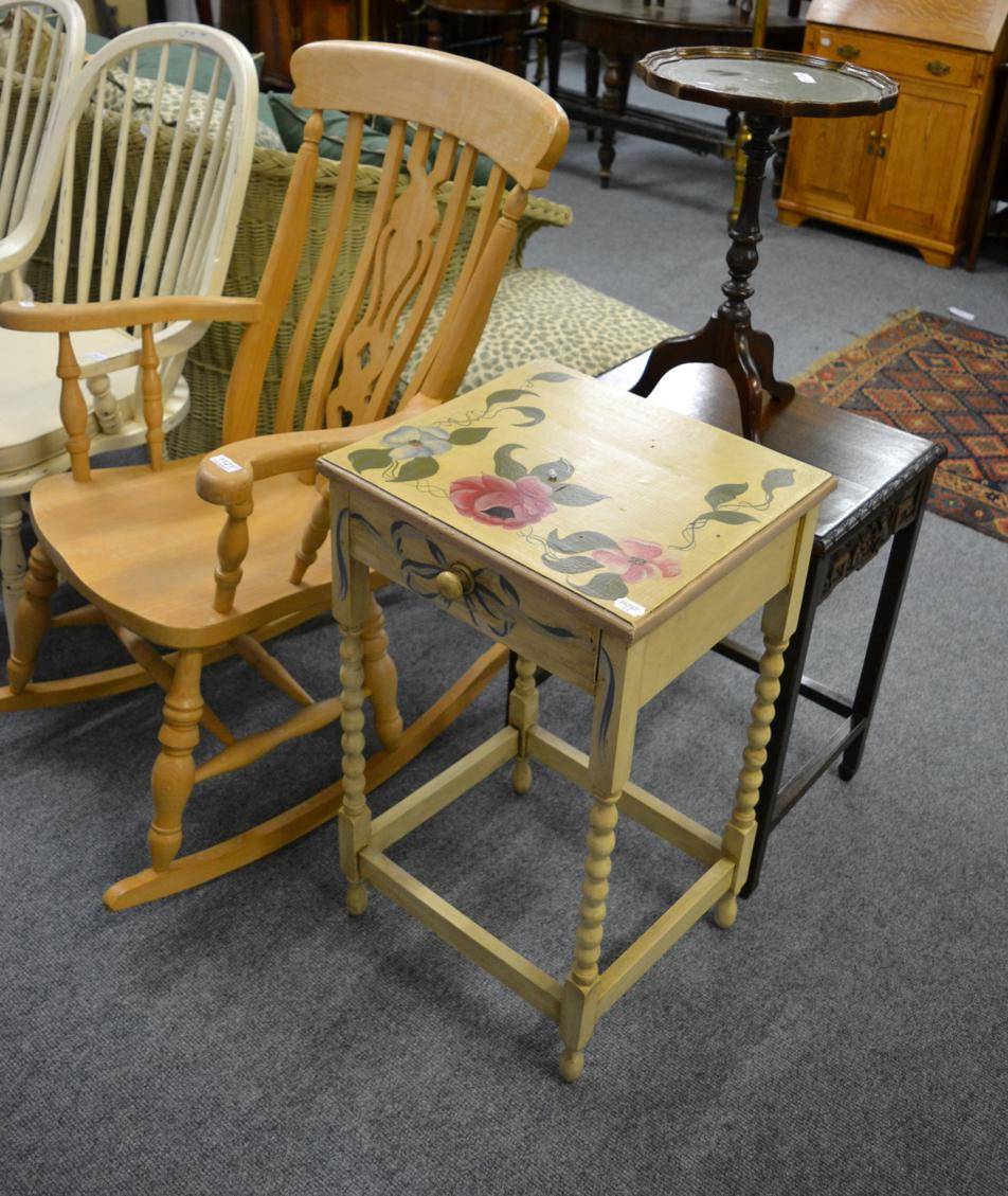 Lot 1121 - A modern rocking chair, a floral painted