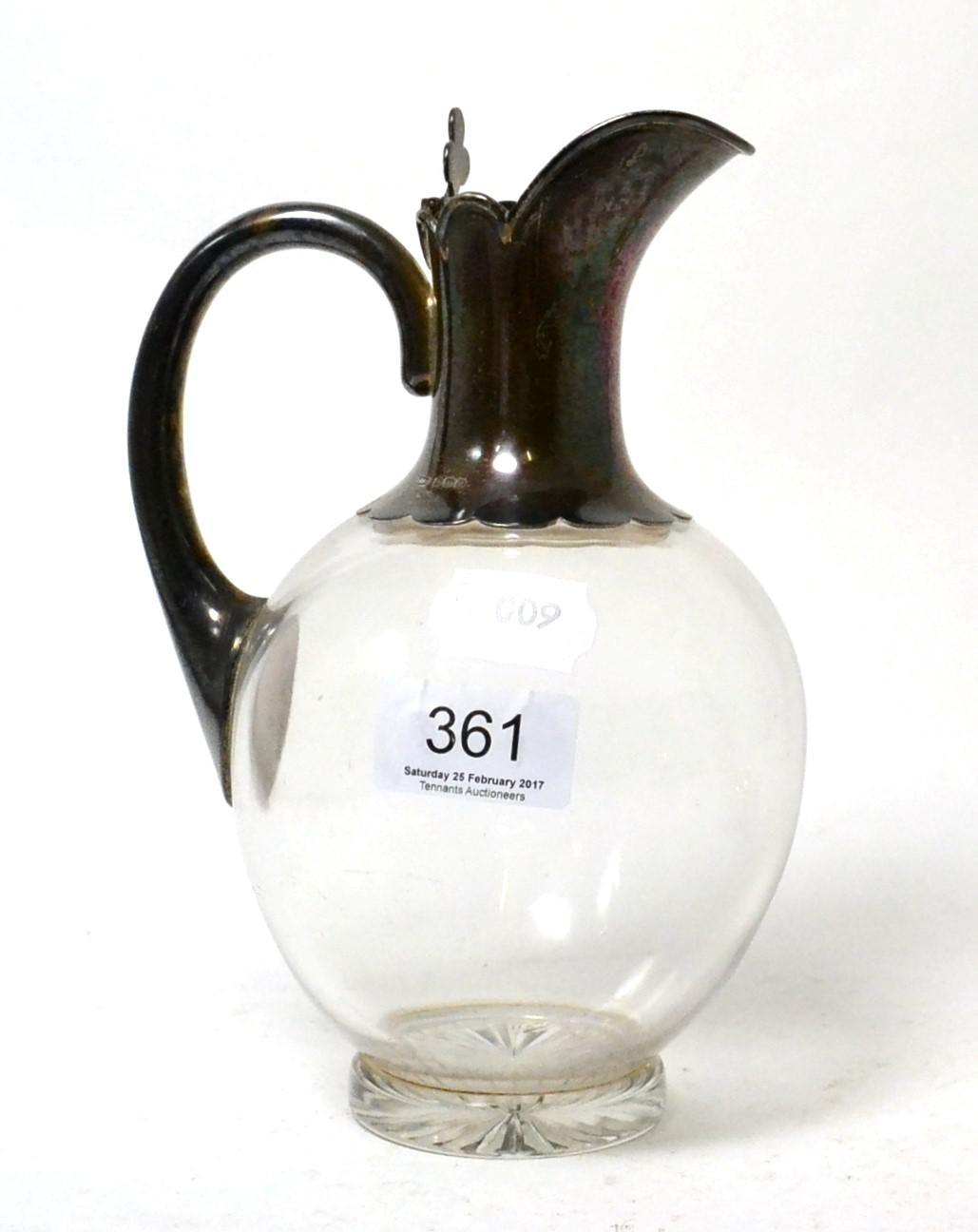 Lot 361 - A George V claret jug in plain glass and