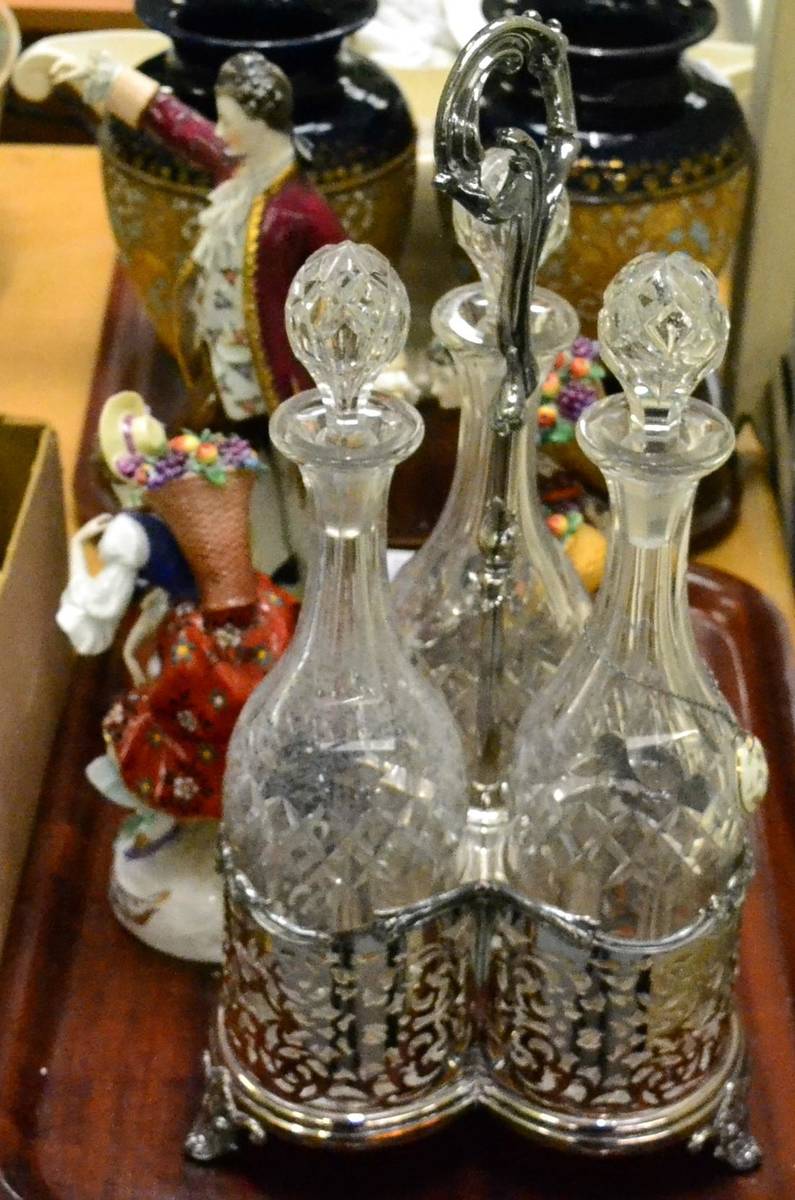 Lot 427 - A silver plated triple glass decanter