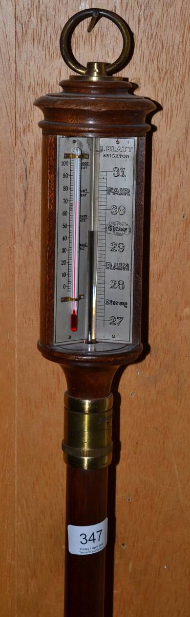 Lot 347 - A reproduction ships type stick barometer,