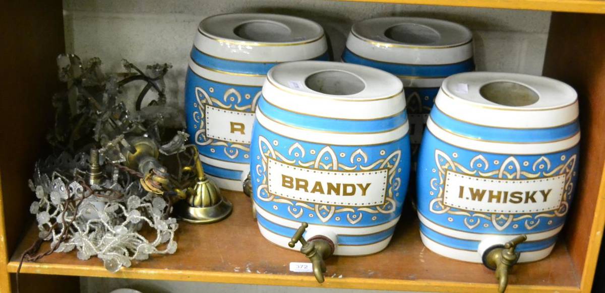 Lot 372 - A set of four Victorian pottery barrel form