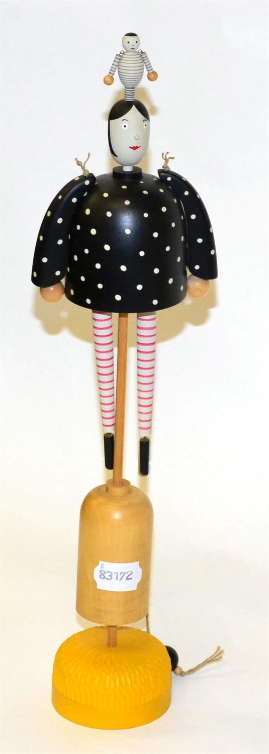 Lot 446 - Ian McKay, a wooden automaton 'Baby on my