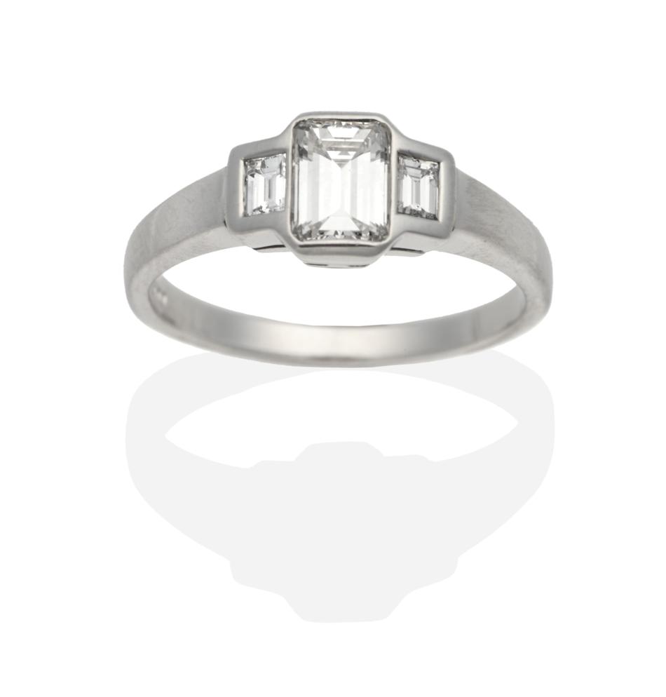 Lot 236 - A Platinum Diamond Three Stone Ring, an
