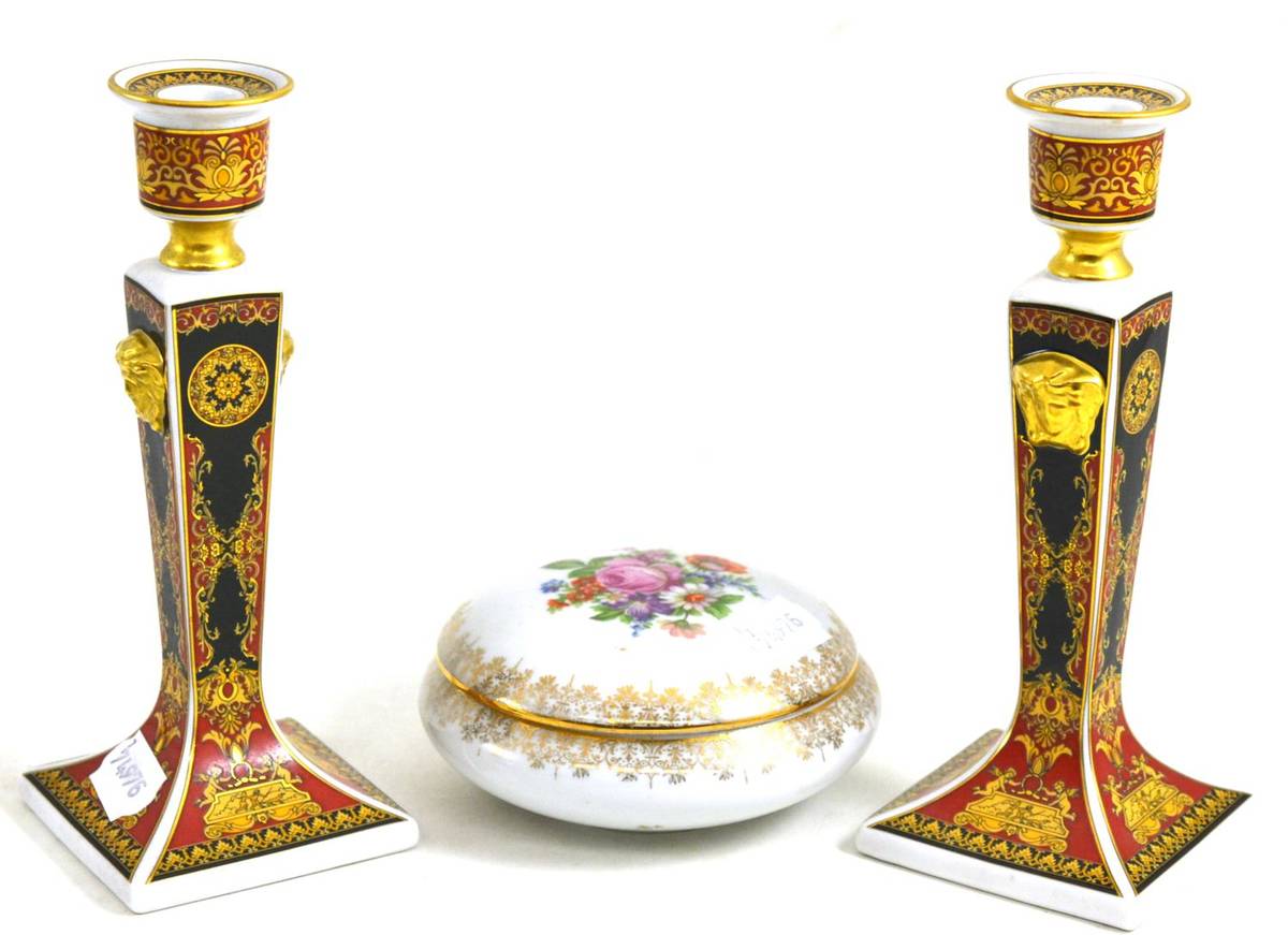 Lot 104 - A pair of Rosenthal candlesticks in the