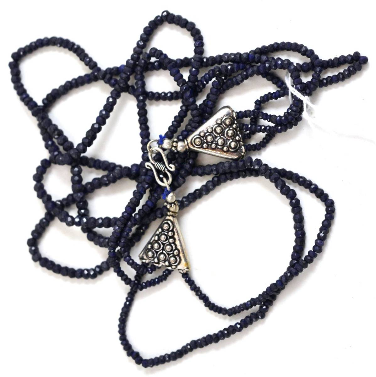 Lot 156 - Four row sapphire bead necklace