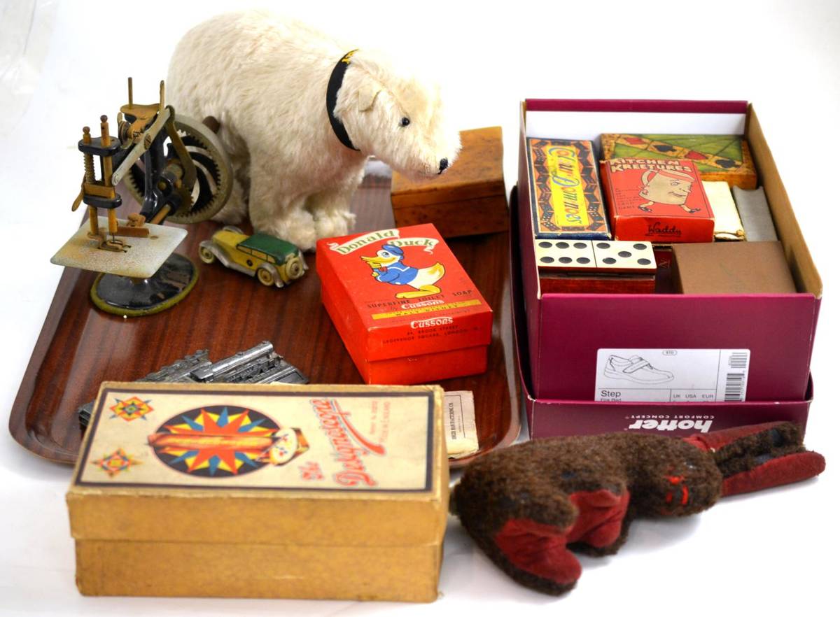 Lot 394 - A Steiff polar bear, assorted playing cards,