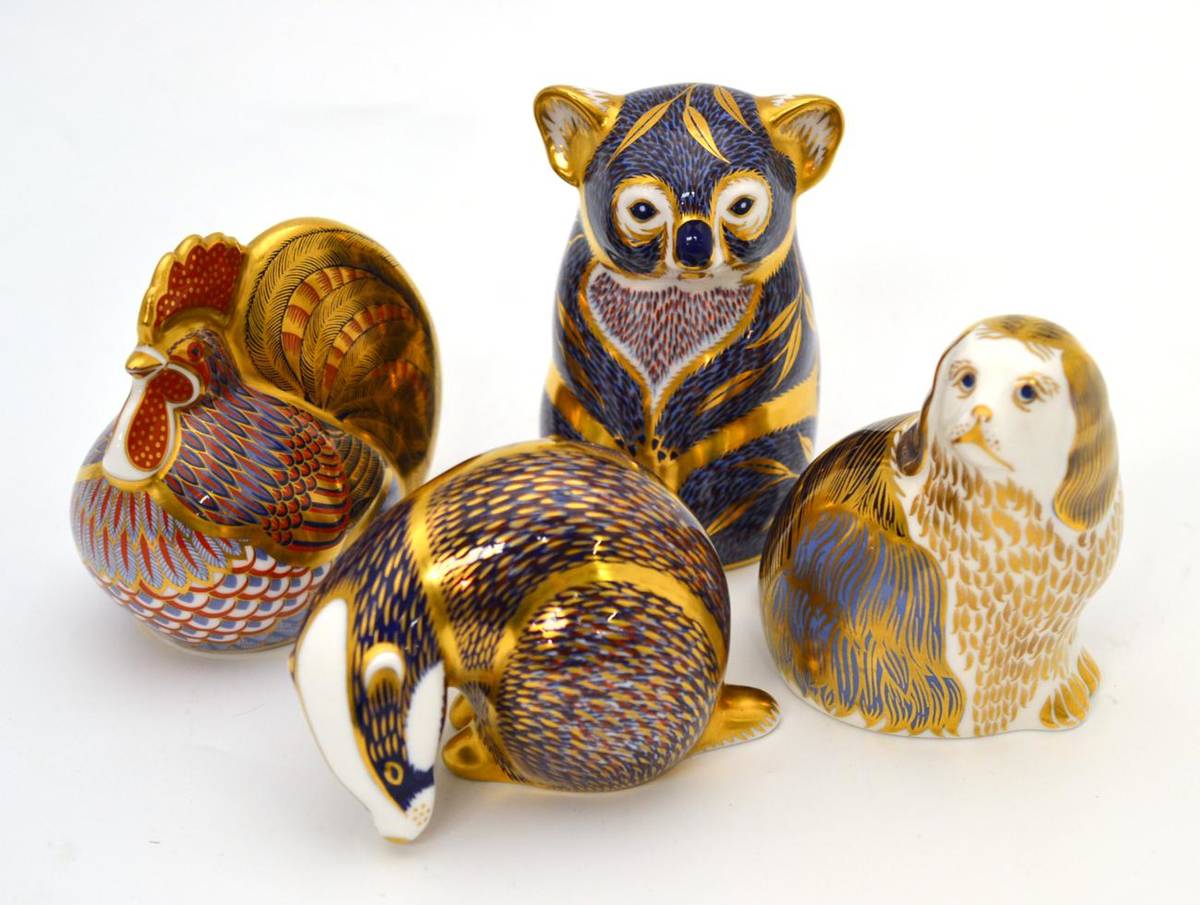 Lot 91 - Four Royal Crown Derby paperweights