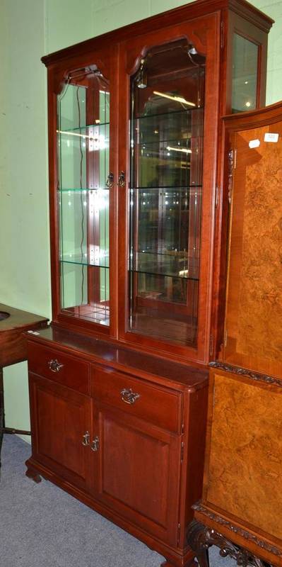 Lot 524 - A reproduction display cabinet