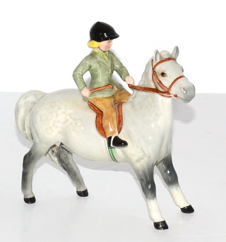 Lot 5092 - Beswick Girl on Pony, model No 1499, light
