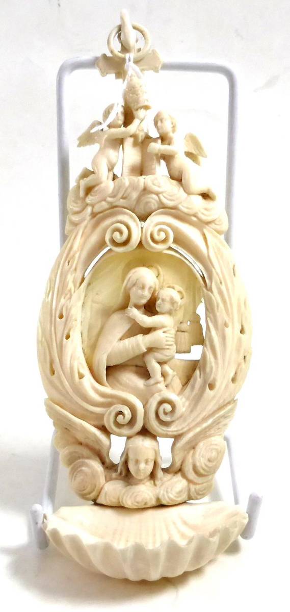 Lot 274 - A late 19th century ivory stoop, carved with
