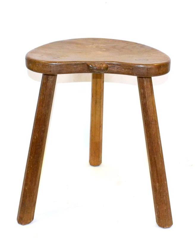 Lot 599 - A Robert "Mouseman " Thompson Oak Cow Stool,