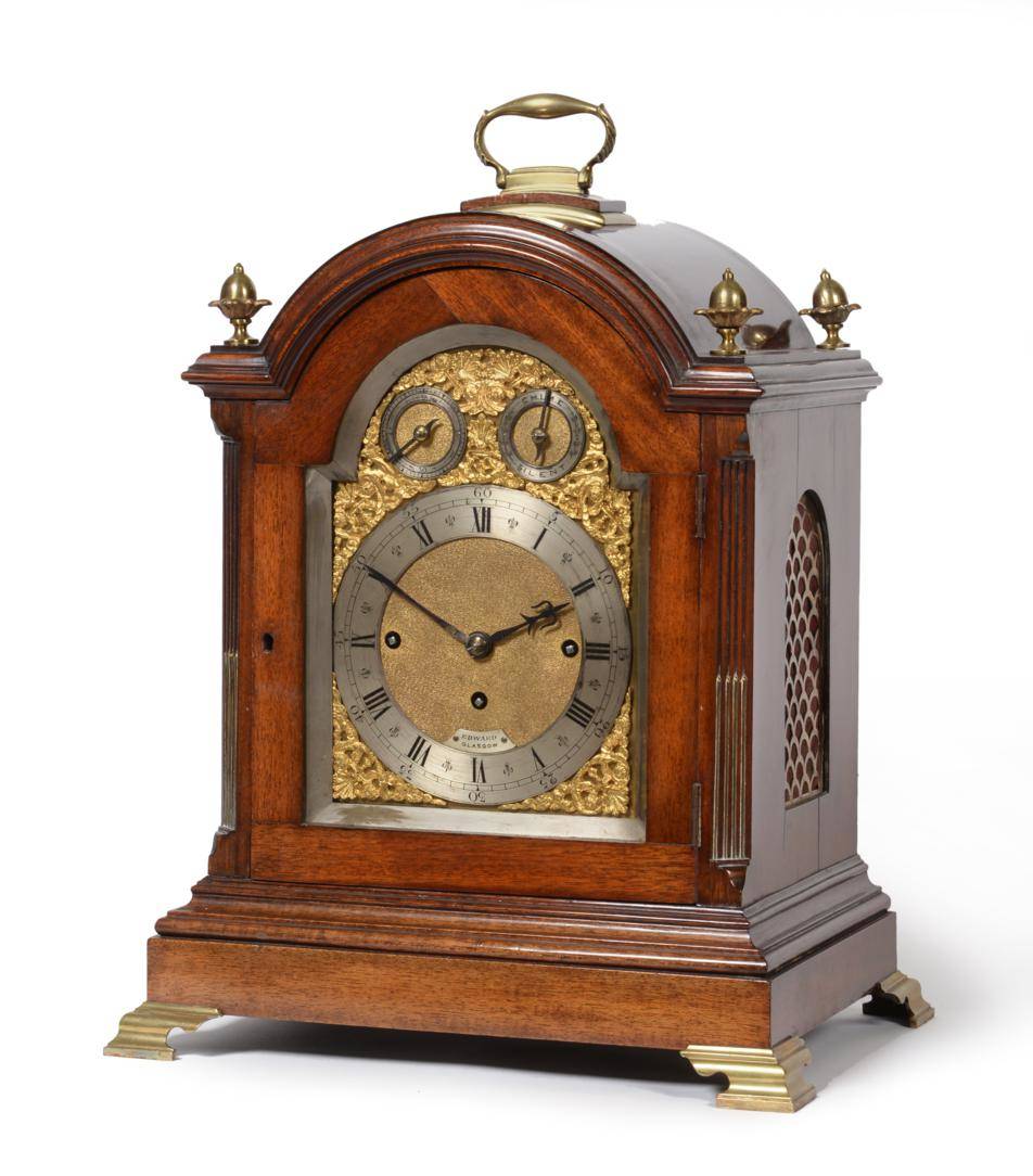 Lot 900 - A Mahogany Chiming Table Clock, signed