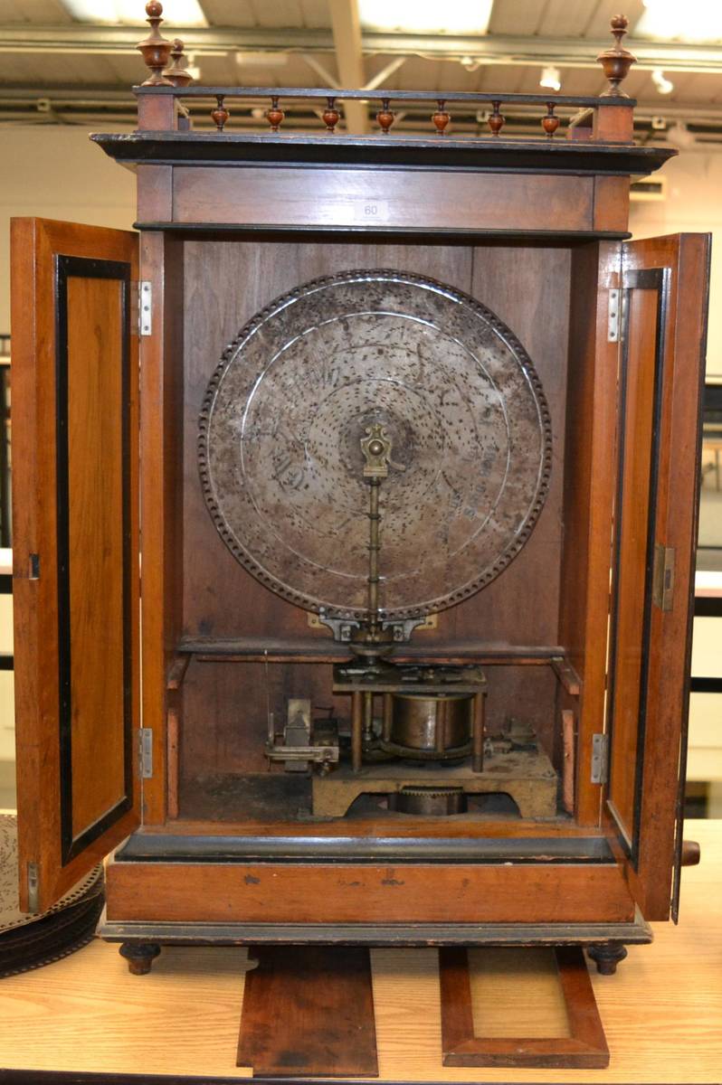 Lot 60 - A Walnut Cased Floor Standing Coin Operated