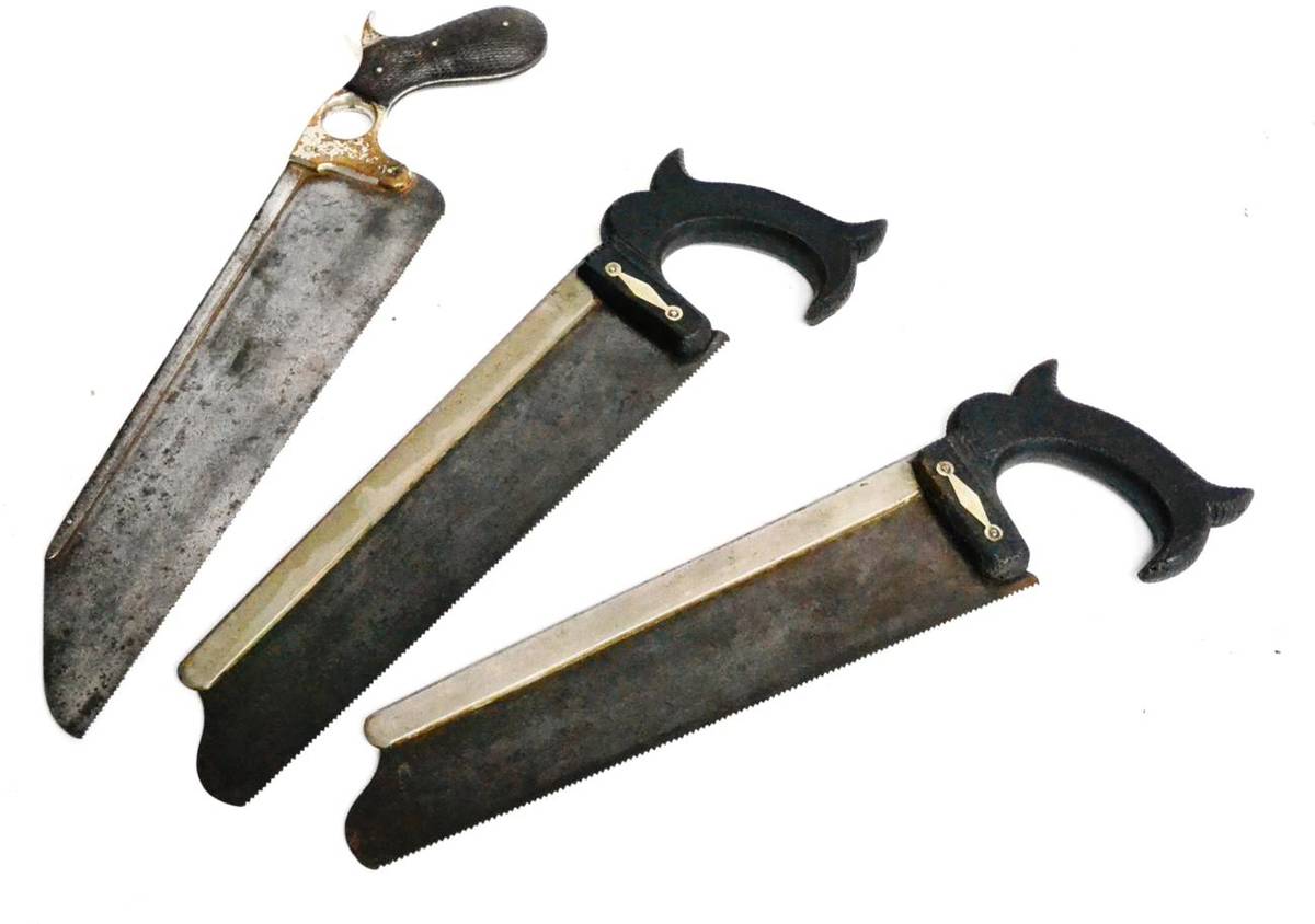 Lot 169 - Three Ebony Handled Steel Bone Saws, two by