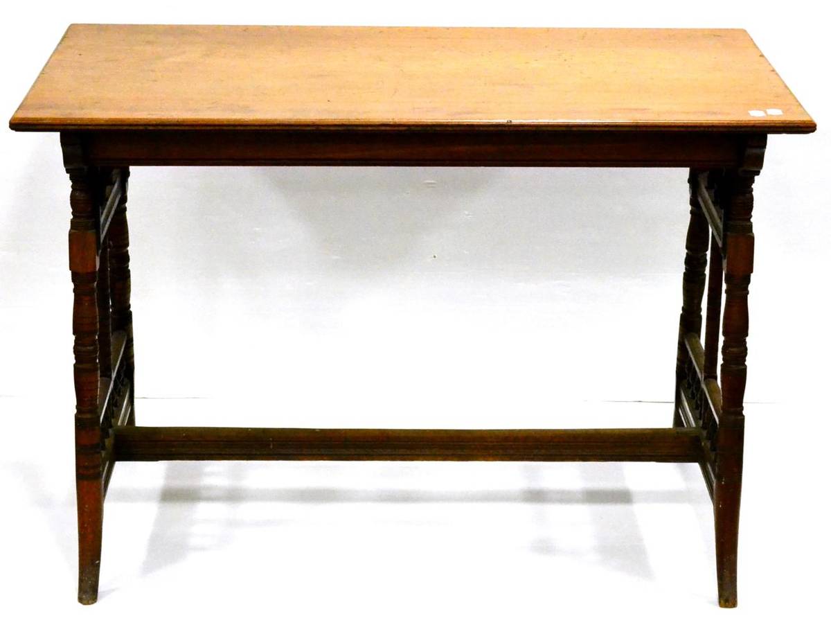 Lot 634 - An Aesthetic Movement Walnut Table,