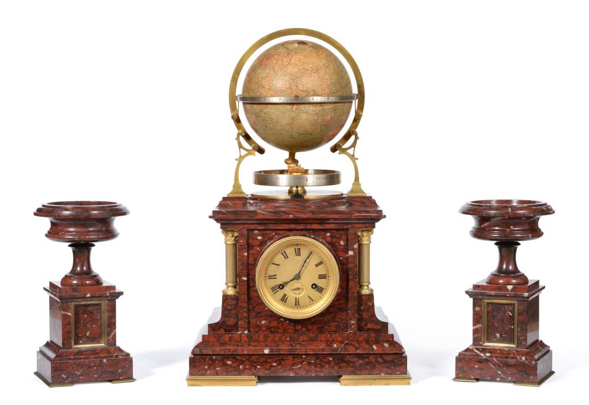 Lot 909 - A Rare and Unusual Red Marble Calendar