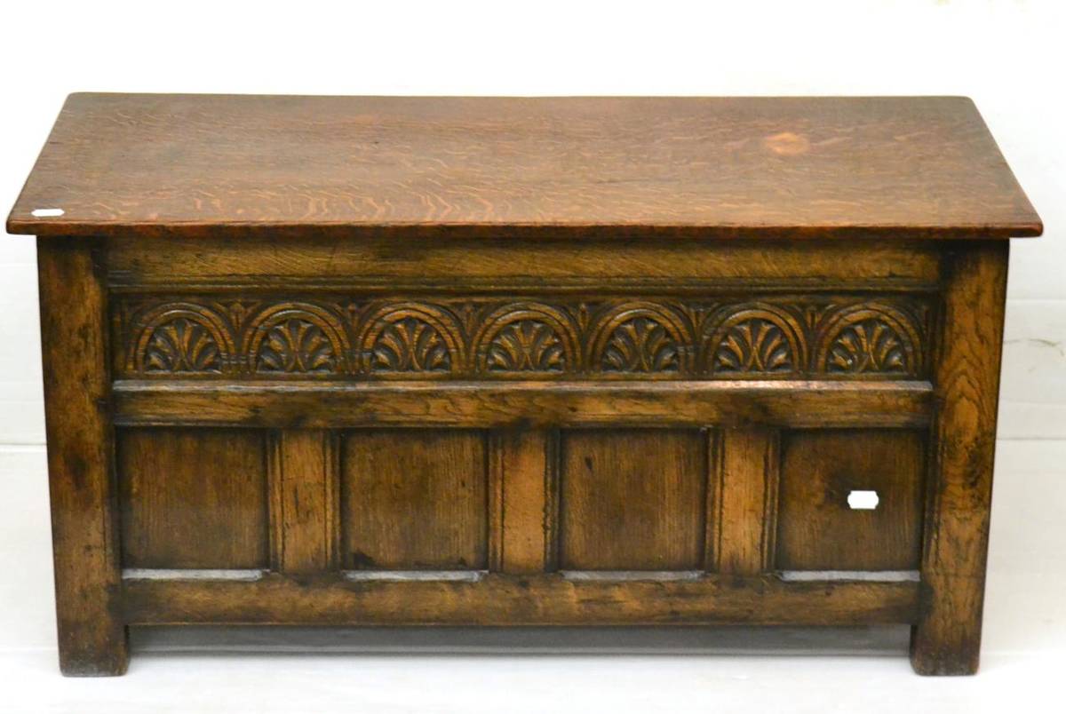 Lot 1124 - A Reproduction Joined Oak Chest, in 18th