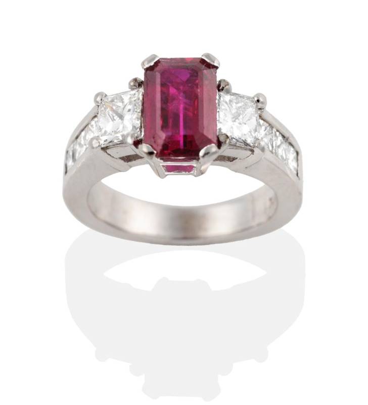 Lot 241 - A Ruby and Diamond Ring, an octagonal cut
