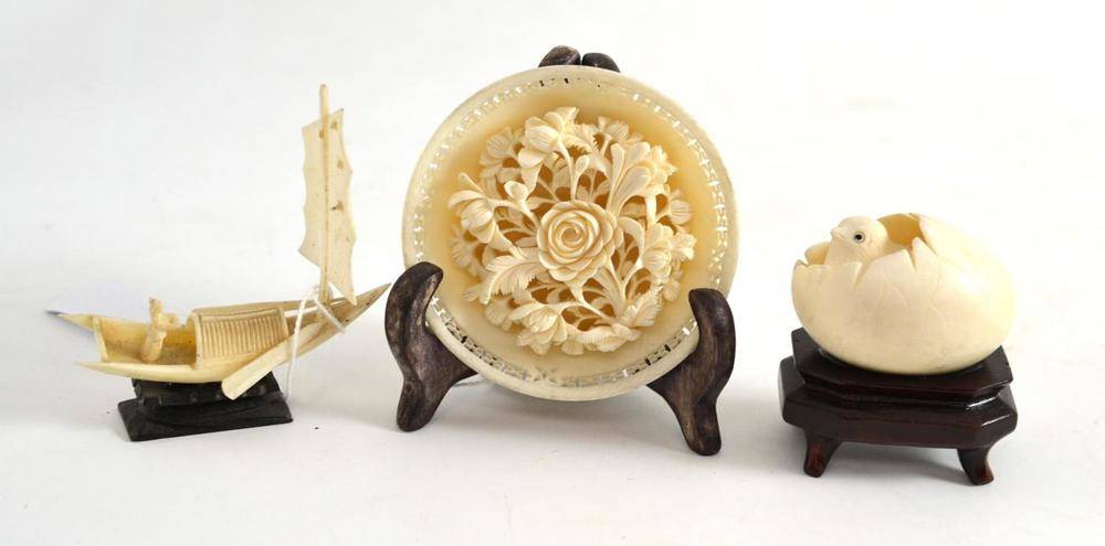 Lot 424 - Early 20th century carved ivory plaque,
