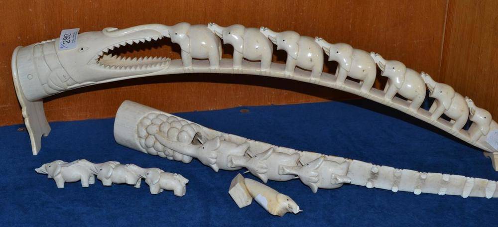 Lot 280 - An African carved elephant ivory bridge of