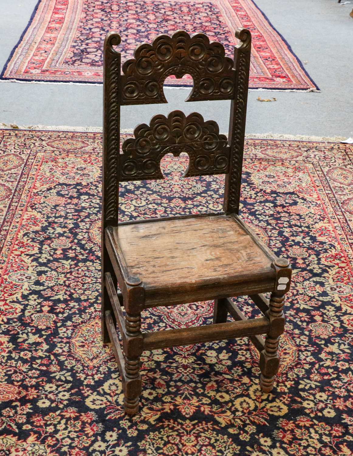 Lot 1311 - A pair of 17th century oak crescent back