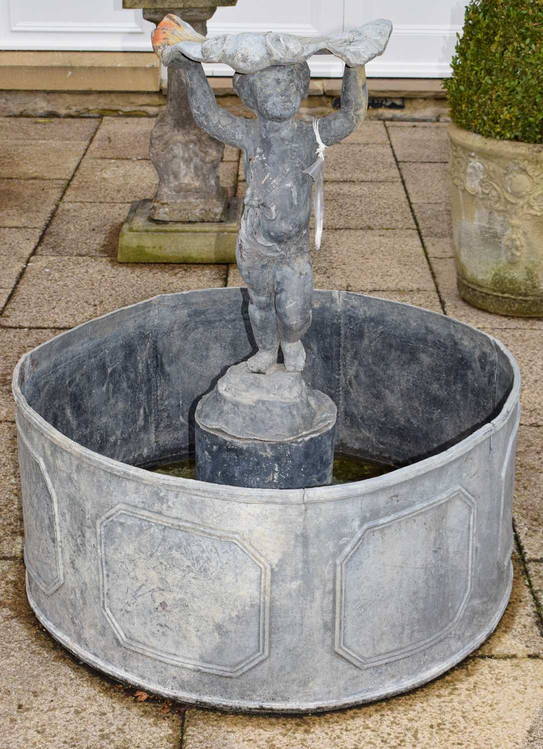 Lot 1306 - A figural lead fountain, the moulded