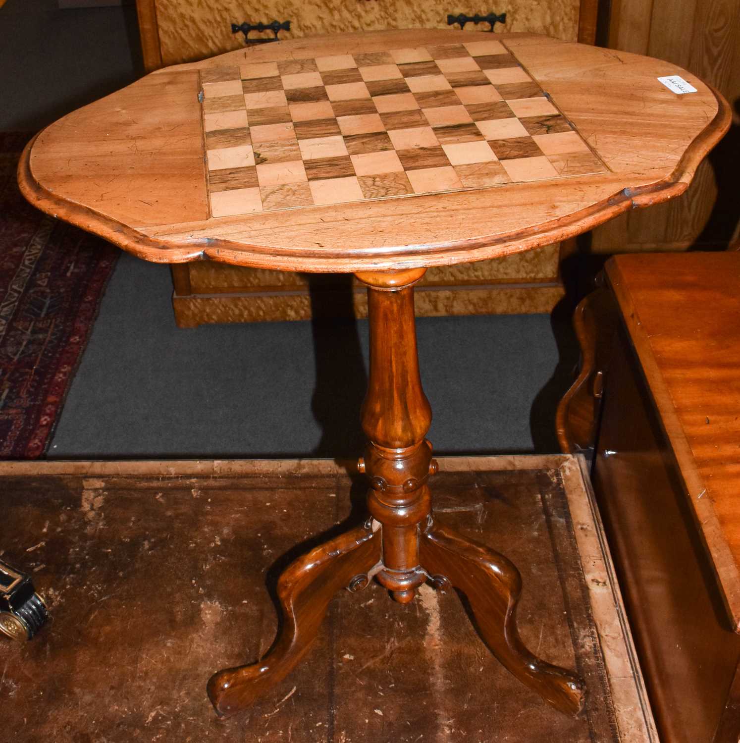 Lot 1330 - A Victorian walnut games table, circa 1870,