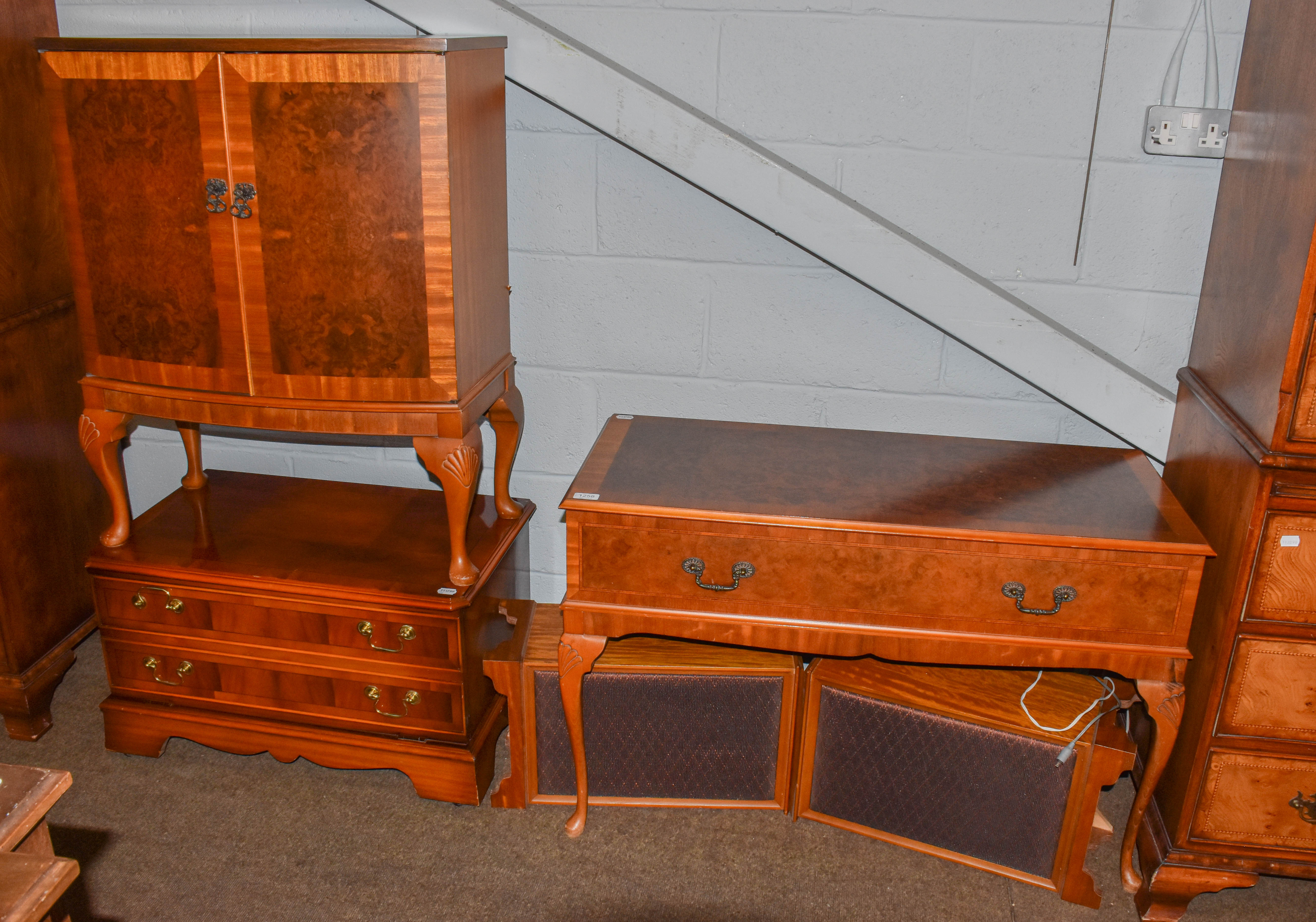 Lot 1258 - A reproduction yew wood dwarf bookcase,