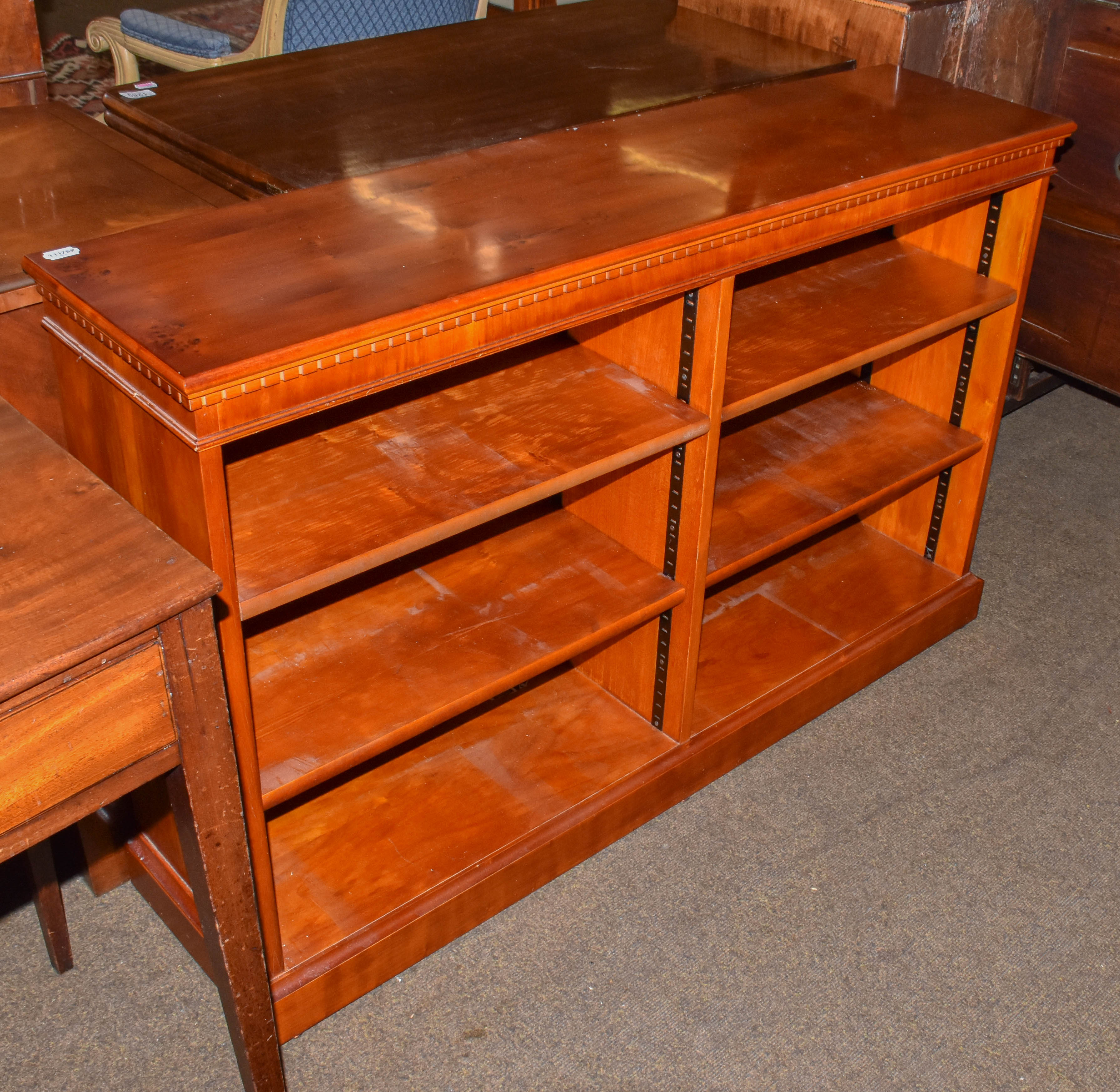 Lot 1258 - A reproduction yew wood dwarf bookcase,