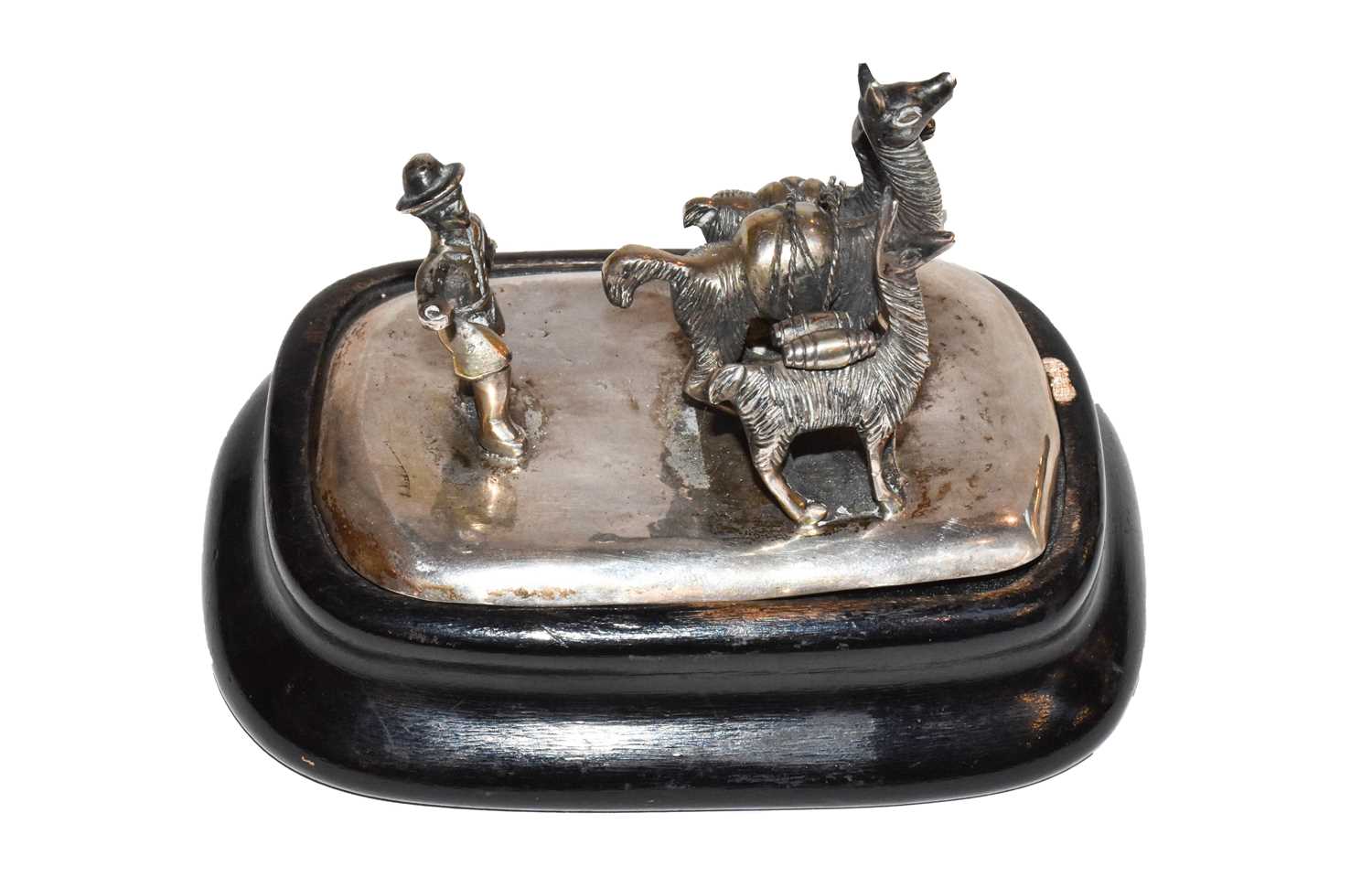A Peruvian white metal model of a figure with llamas | Barnebys