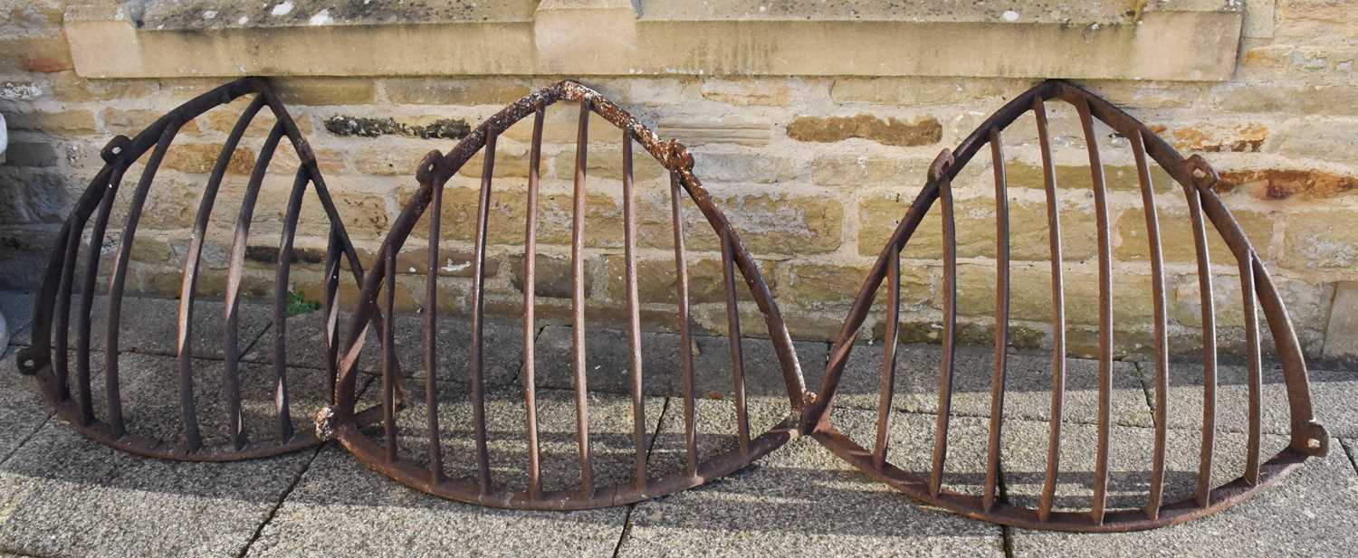 Lot 1332 - Three Victorian iron hay racks (two a.f.),