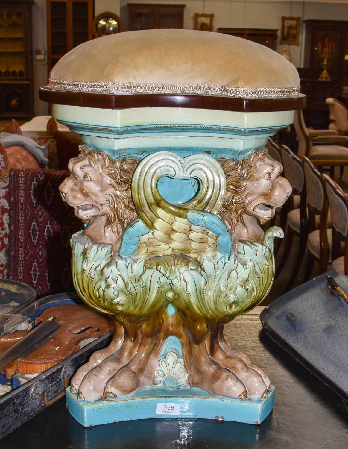 Lot 356 - A 19th century Majolica stool of triform
