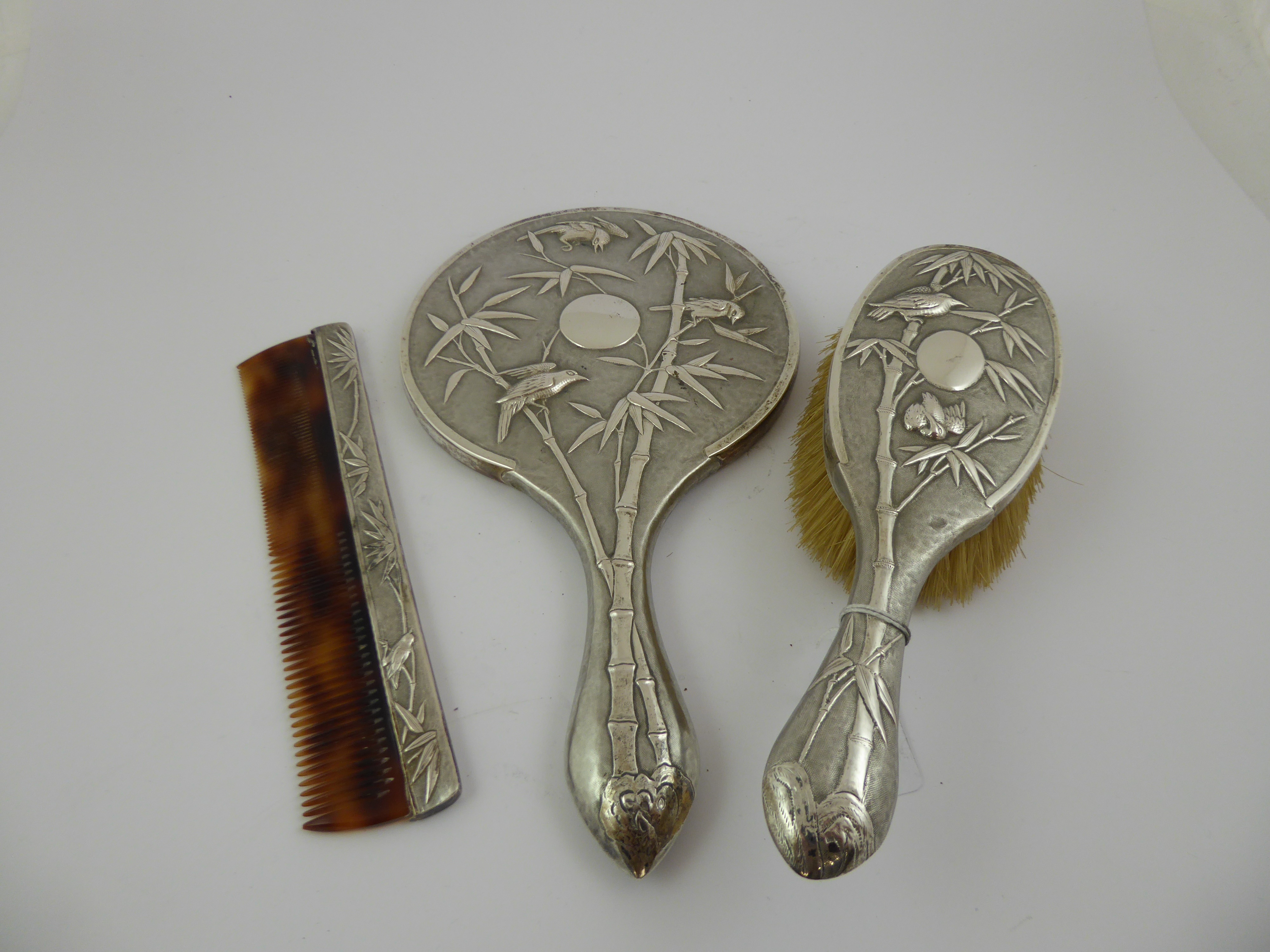 Lot 2182 - A Four-Piece Chinese Export Silver Dressing-