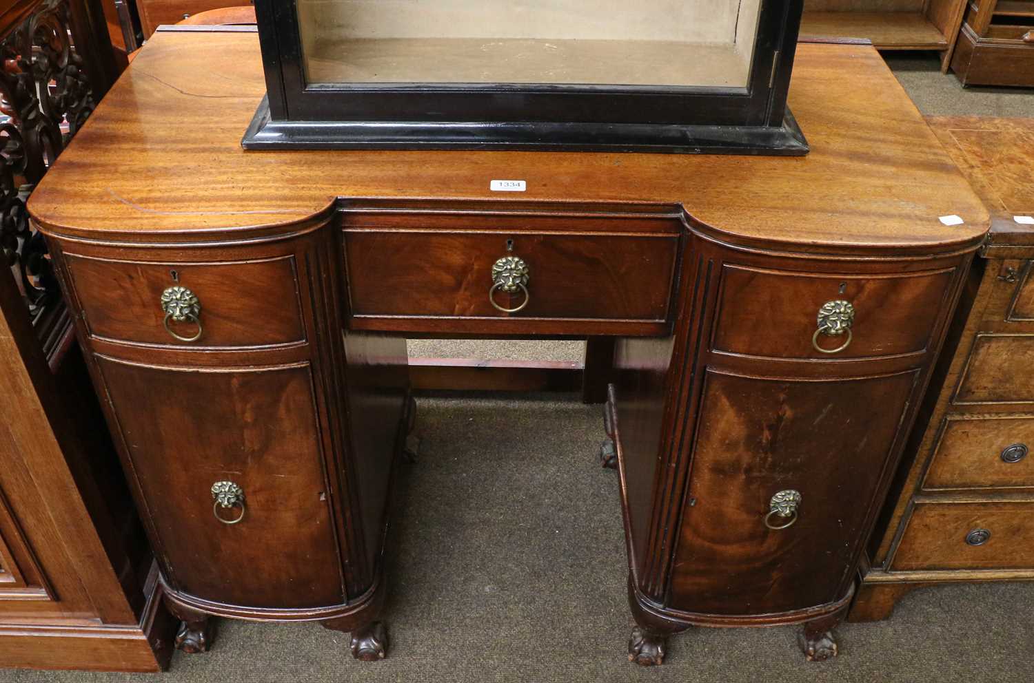 Lot 1334 - A reproduction mahogany sideboard in the