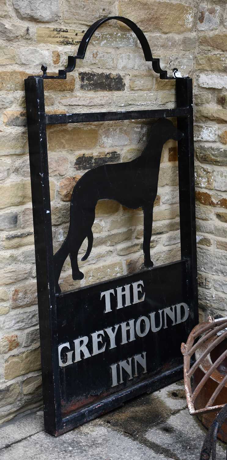 Lot 1343 - A large double-sided metal pub sign with