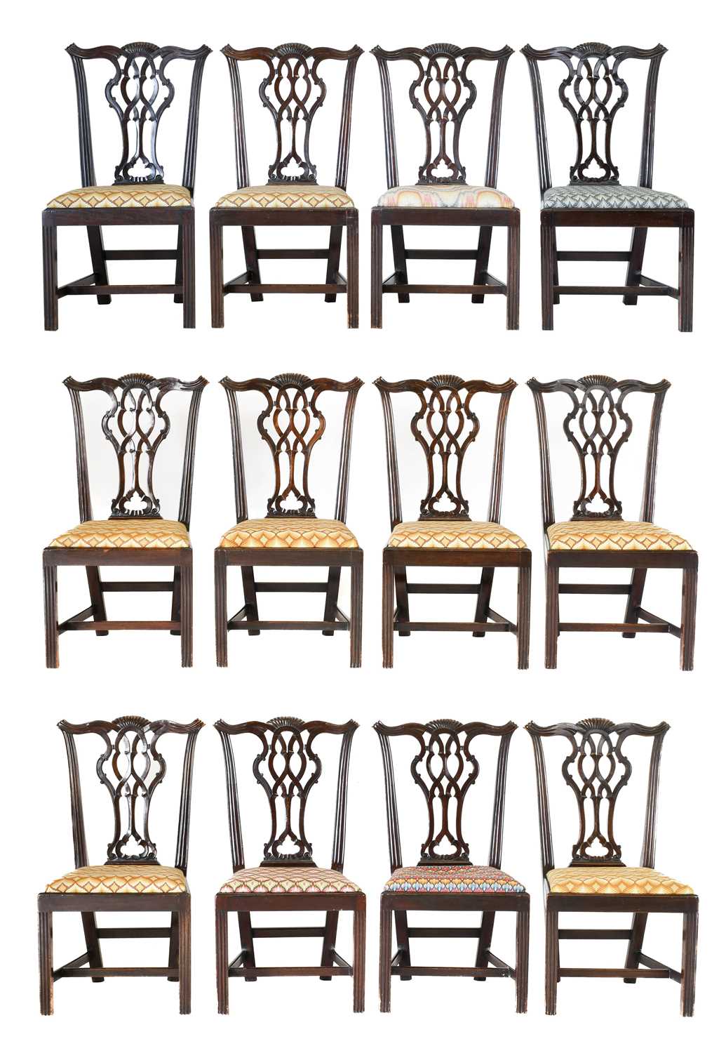 Lot 325 - A Set of Twelve Chippendale Design Carved