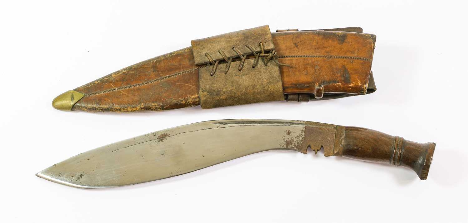 Lot 2313 - A Gurkha Kukri, the 34cm single edge curved