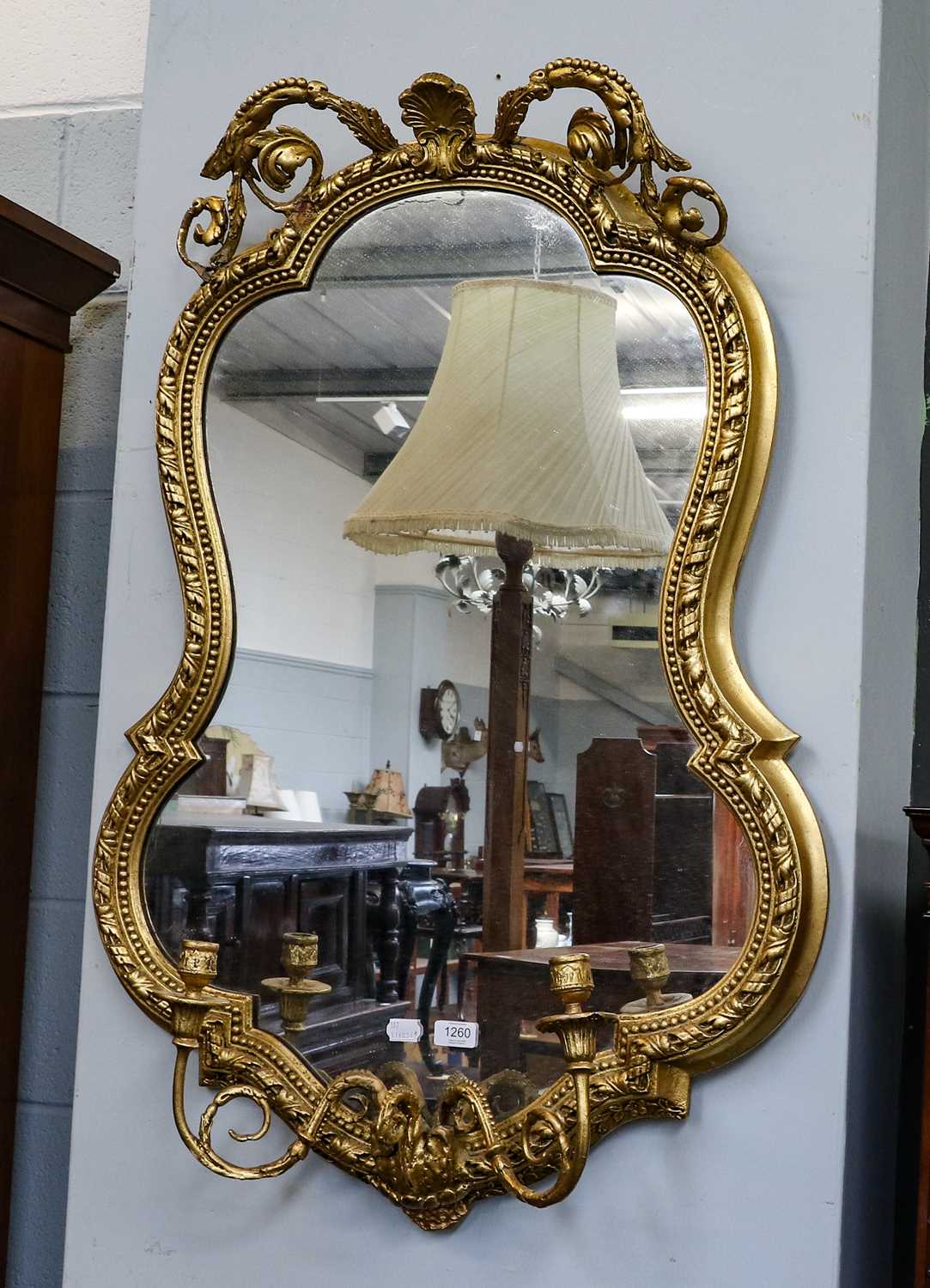 Lot 1260 - A 19th-century gilt girandole, the shell