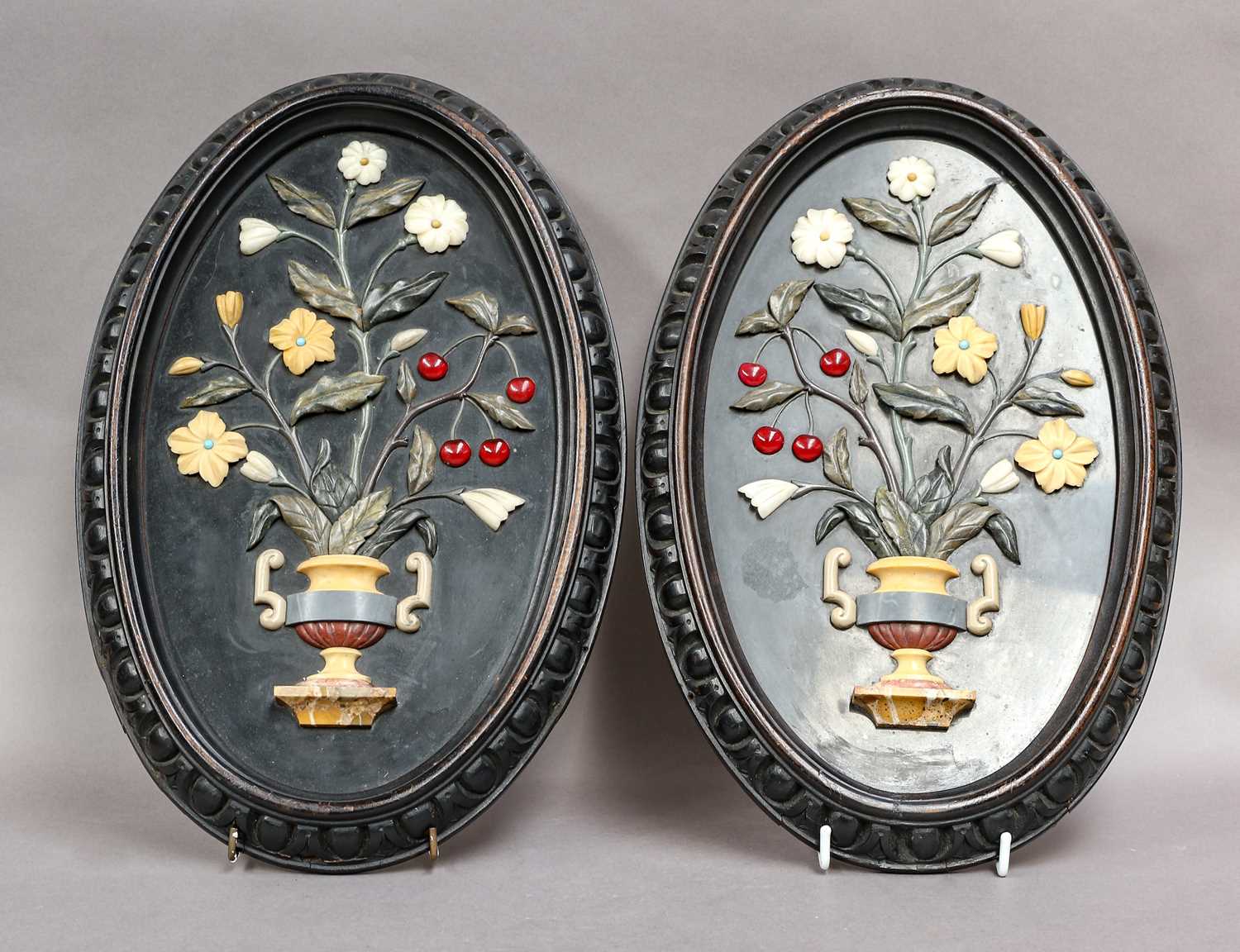 Lot 311 - A pair of specimen marble plaques of ovoid
