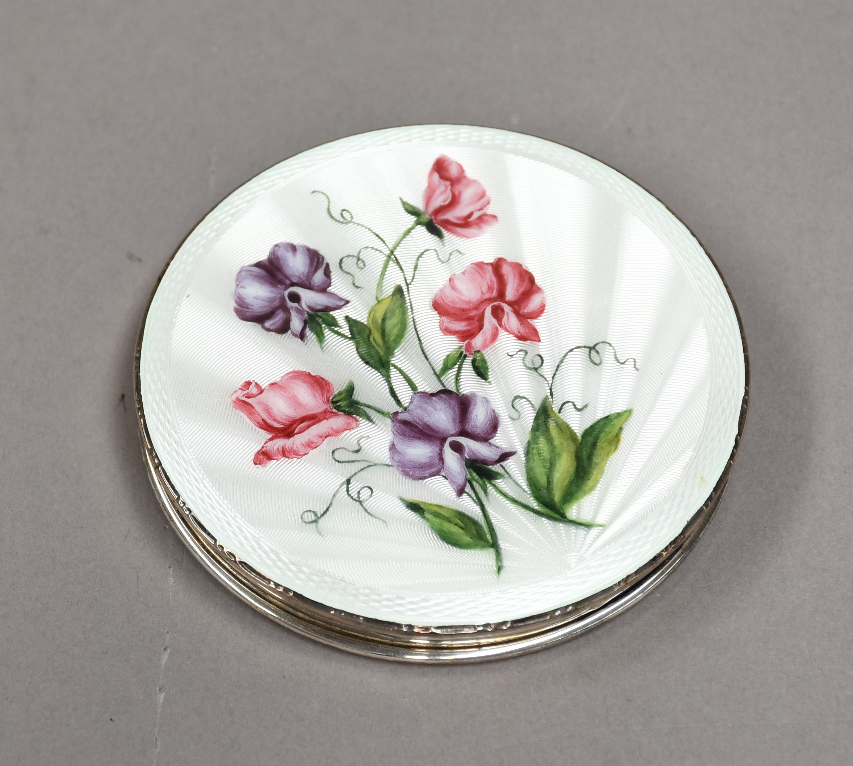 Lot 254 - Walker & Hall silver compact with enamel