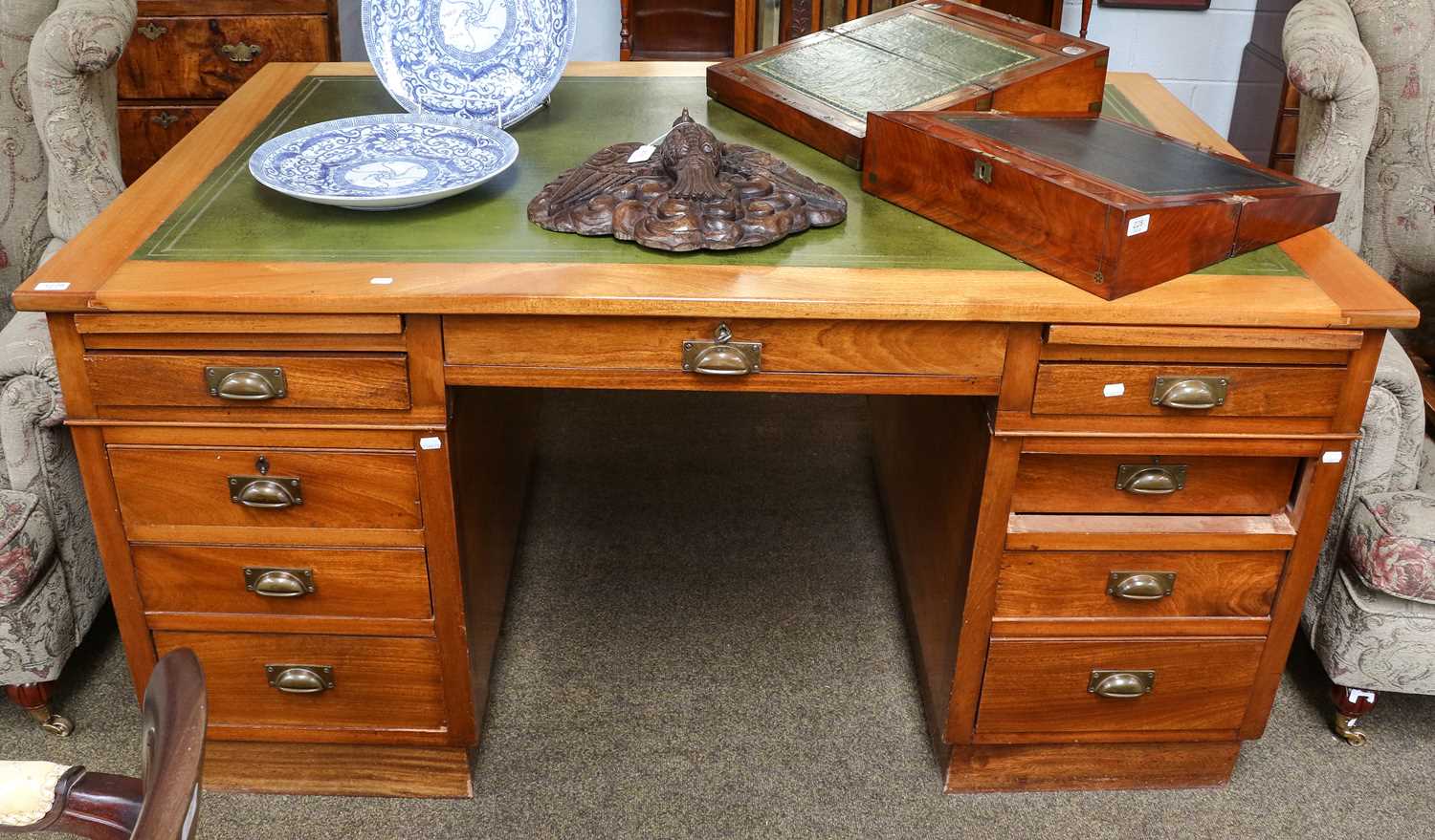 Lot 1278 - An early 20th century leather inset desk,